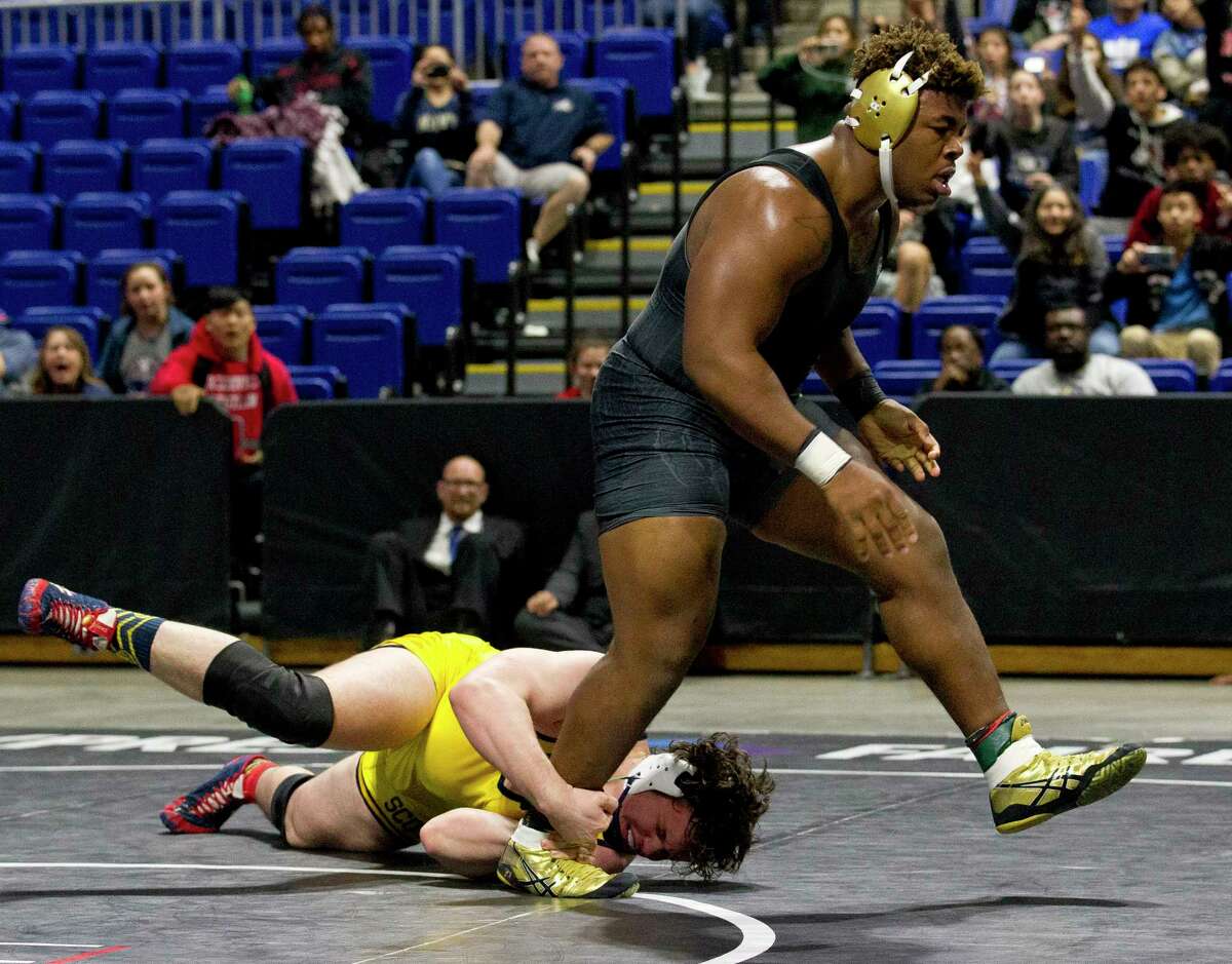 WRESTLING: Robinson finishes career with gold at state