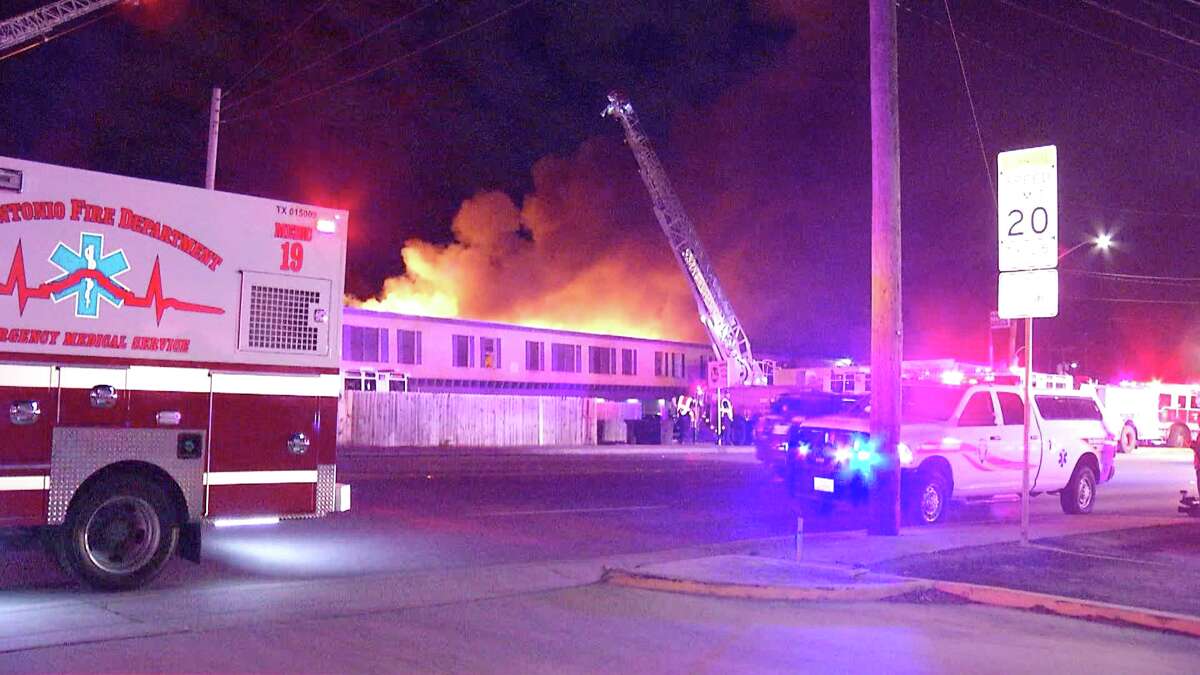 San Antonio firefighters rescue two people from fast-moving fire at ...