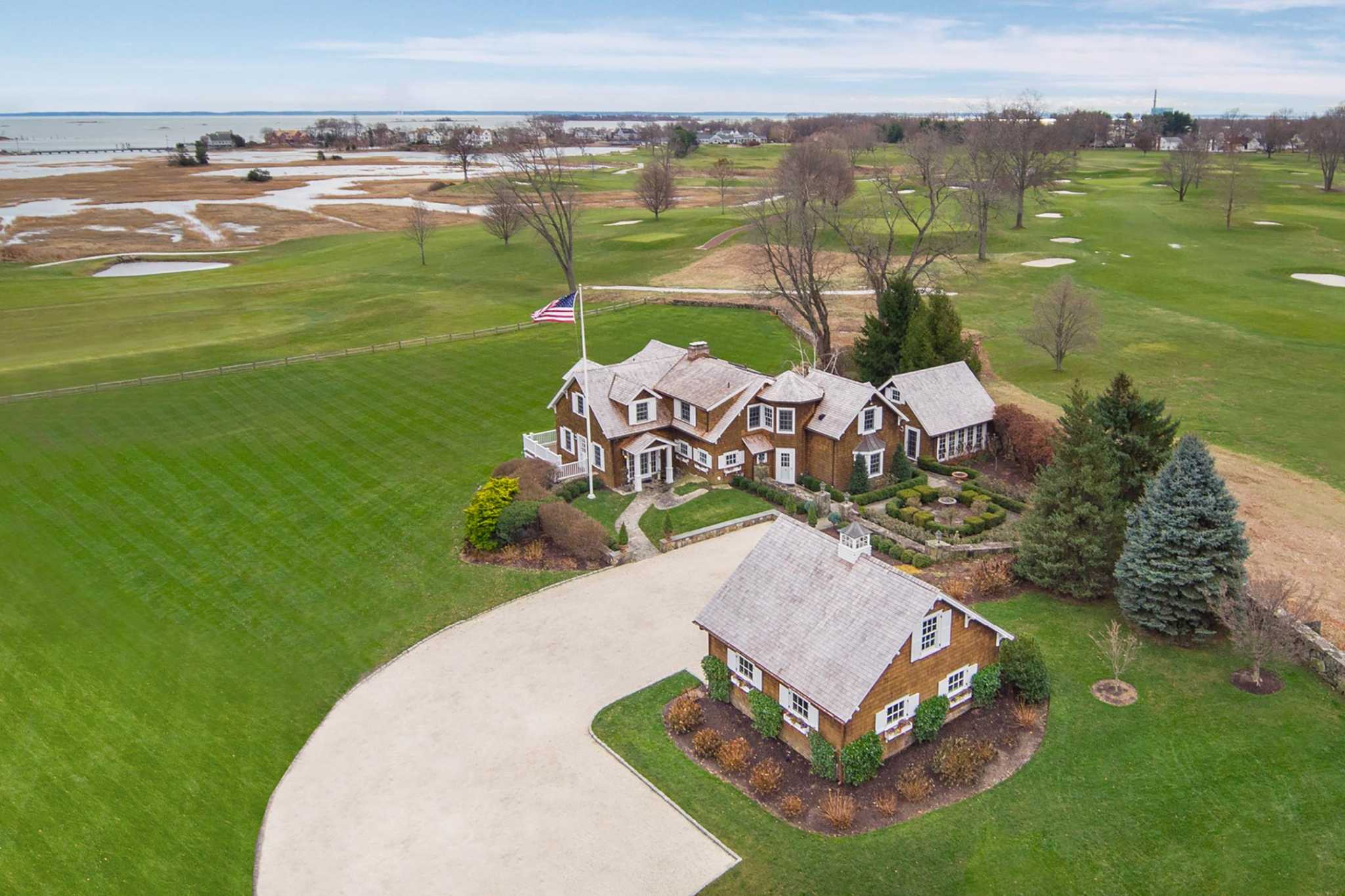 Nantucket-style home has elegance, country-club setting
