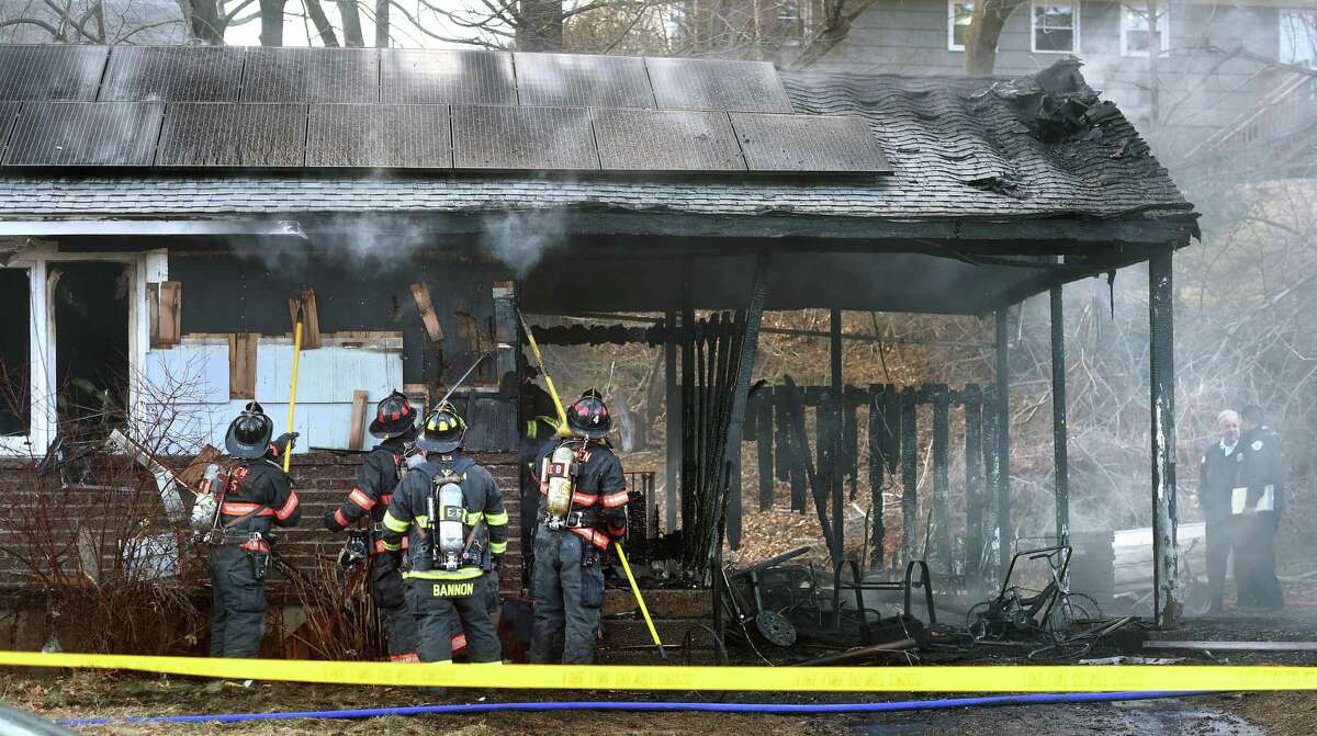 Man alerted by neighbors escapes fire in Hamden home but dog dies