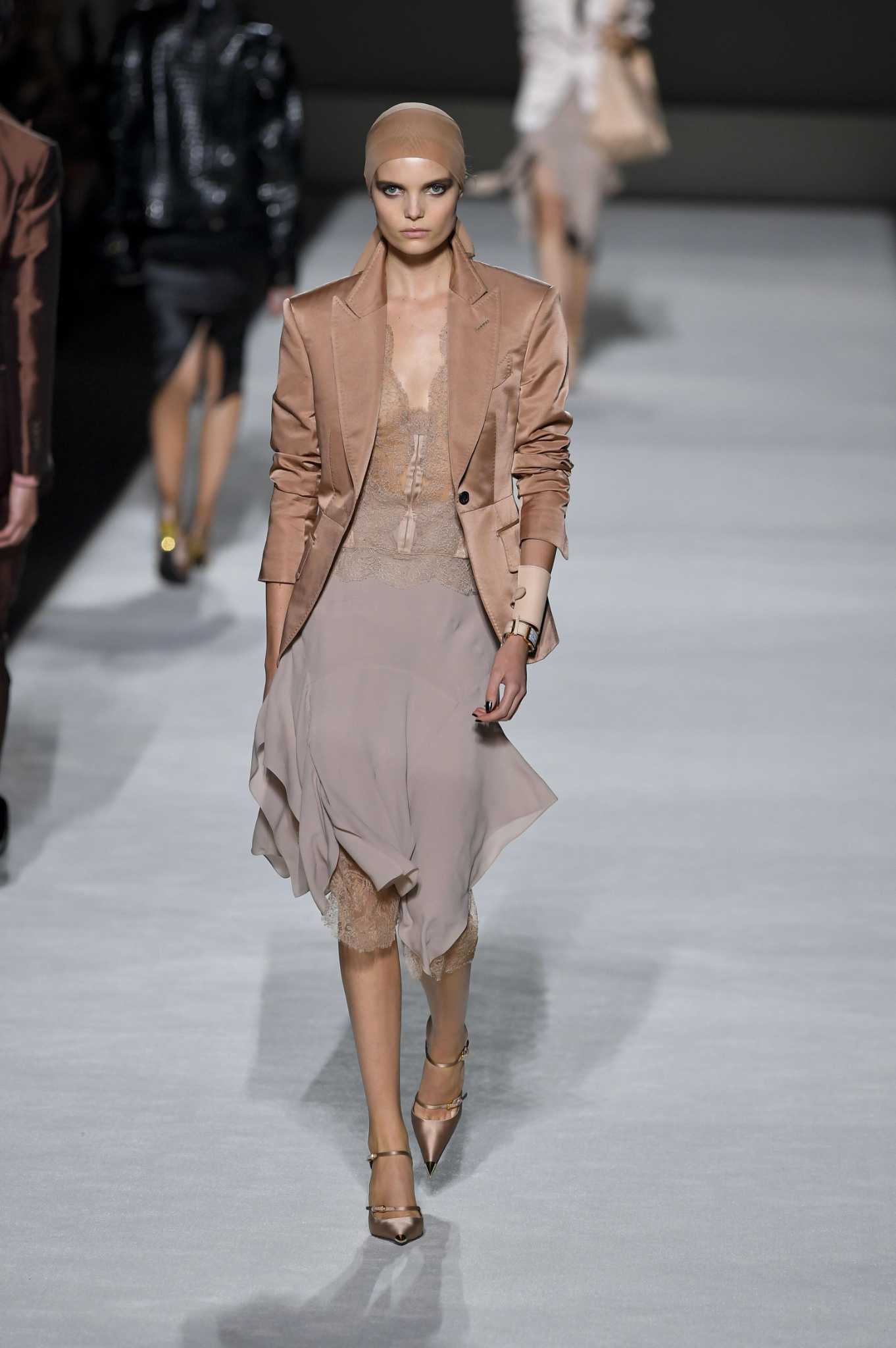 Spring brings ubiquitous beige to designer fashion collections