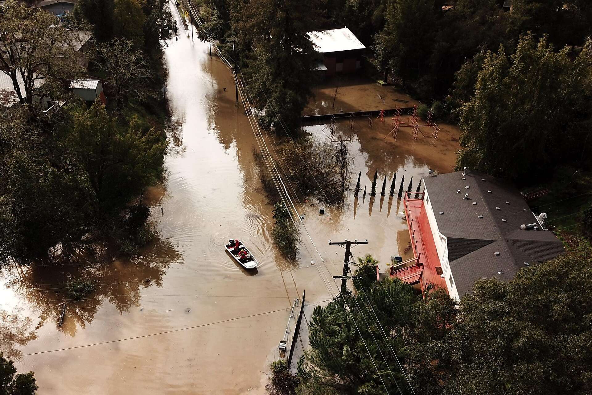Rivers where roads should be: Drone footage shows extreme flooding in ...