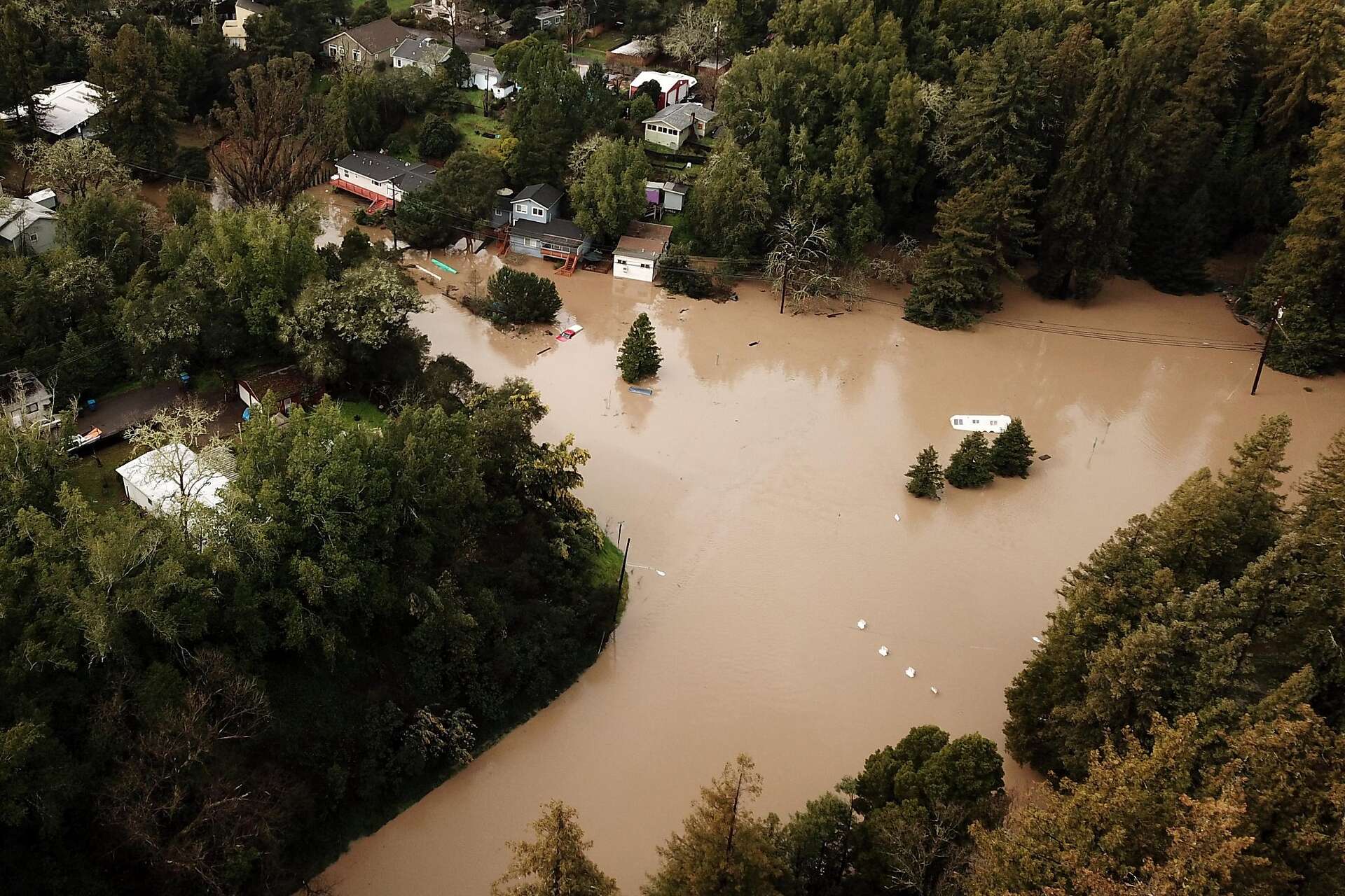 Rivers where roads should be: Drone footage shows extreme flooding in ...