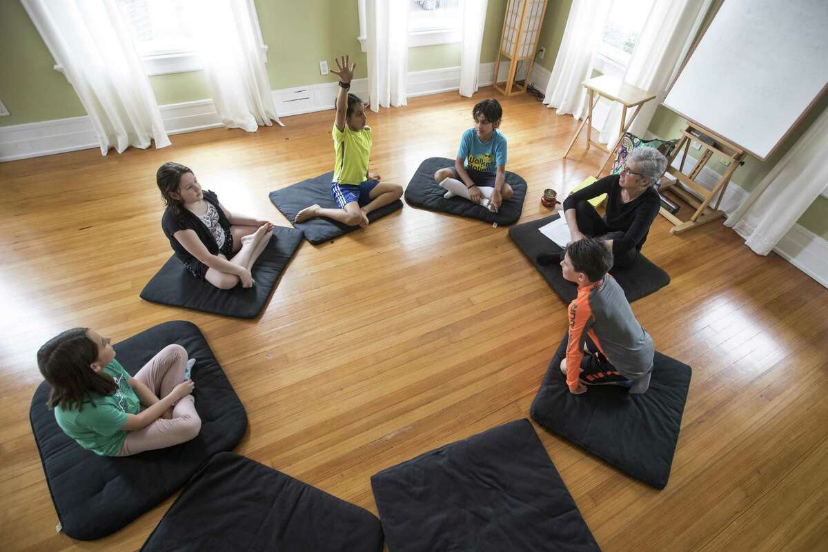 Mindfulness for third-graders? Meditation, yoga help kids ward off ...