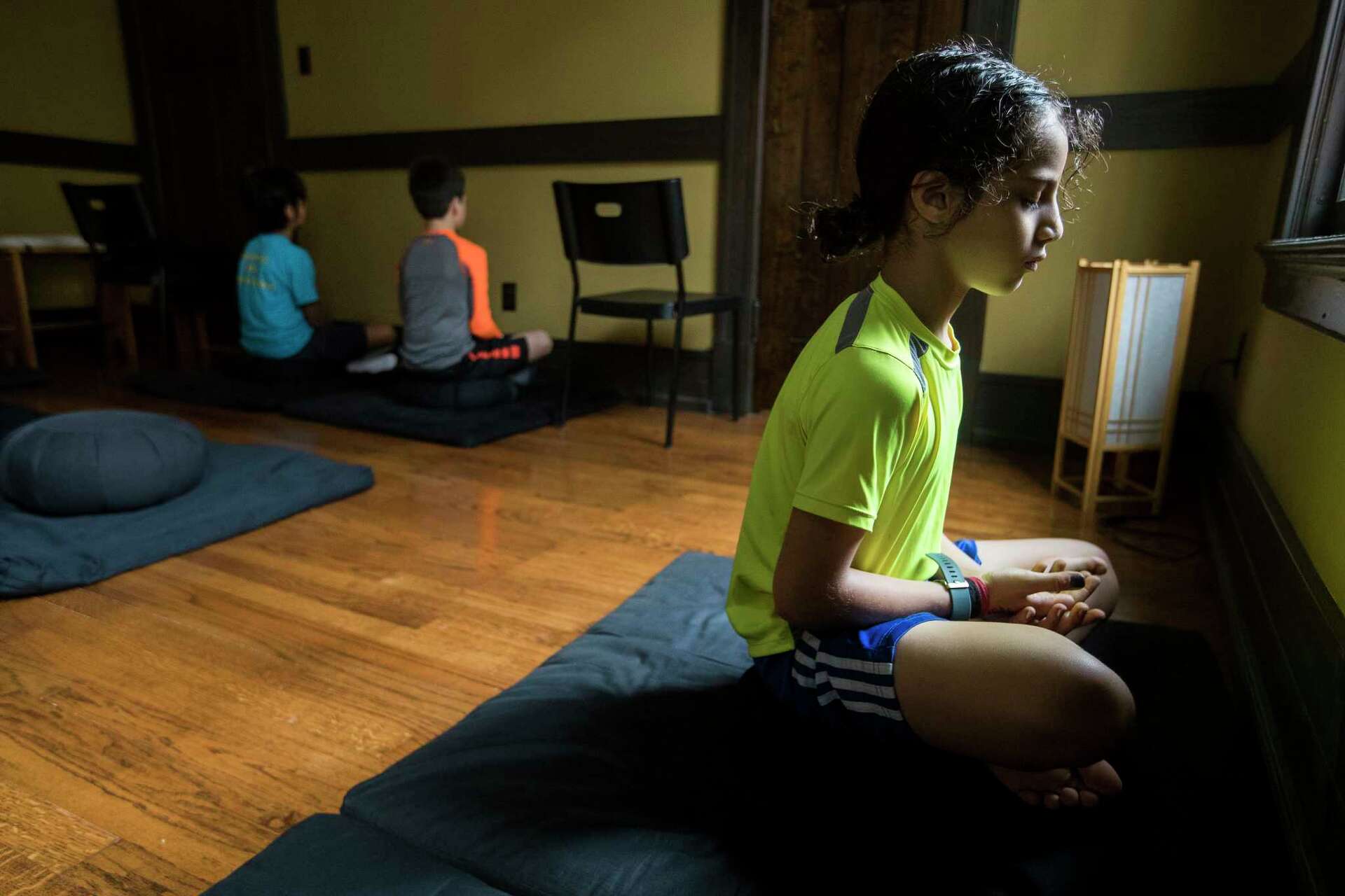 Mindfulness for third-graders? Meditation, yoga help kids ward off ...
