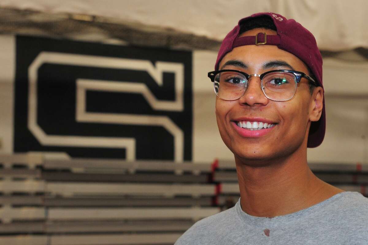 Staples’ Chet Ellis jumping over the competition