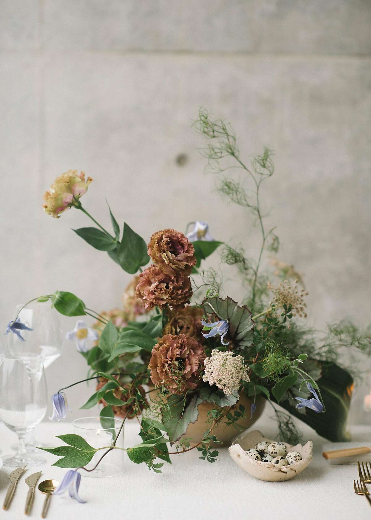 Florists highlight floral displays in beautiful, custom vases that they ...