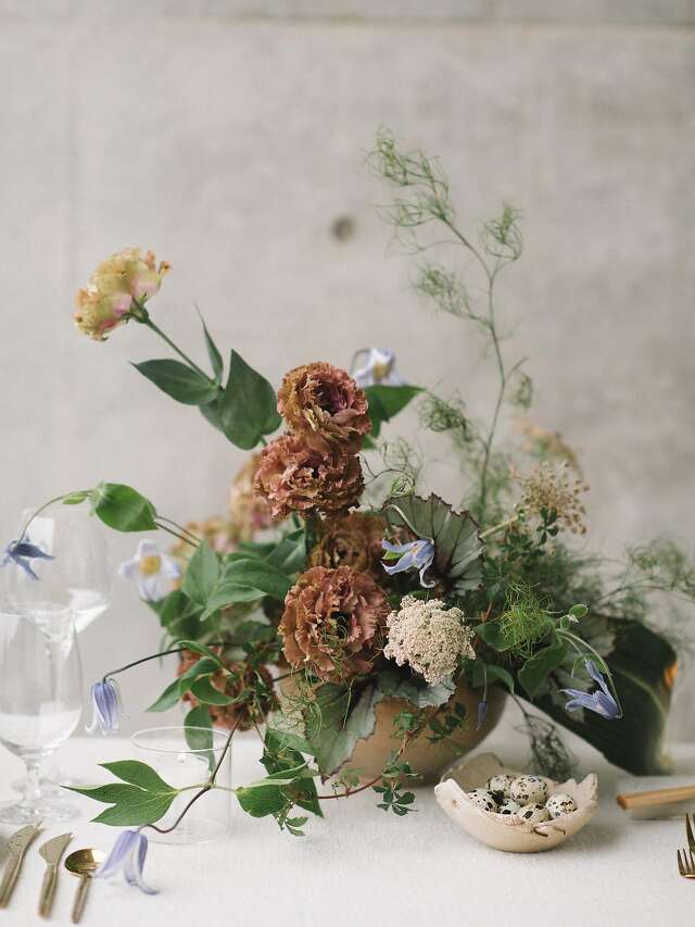 Florists highlight floral displays in beautiful, custom vases that they ...