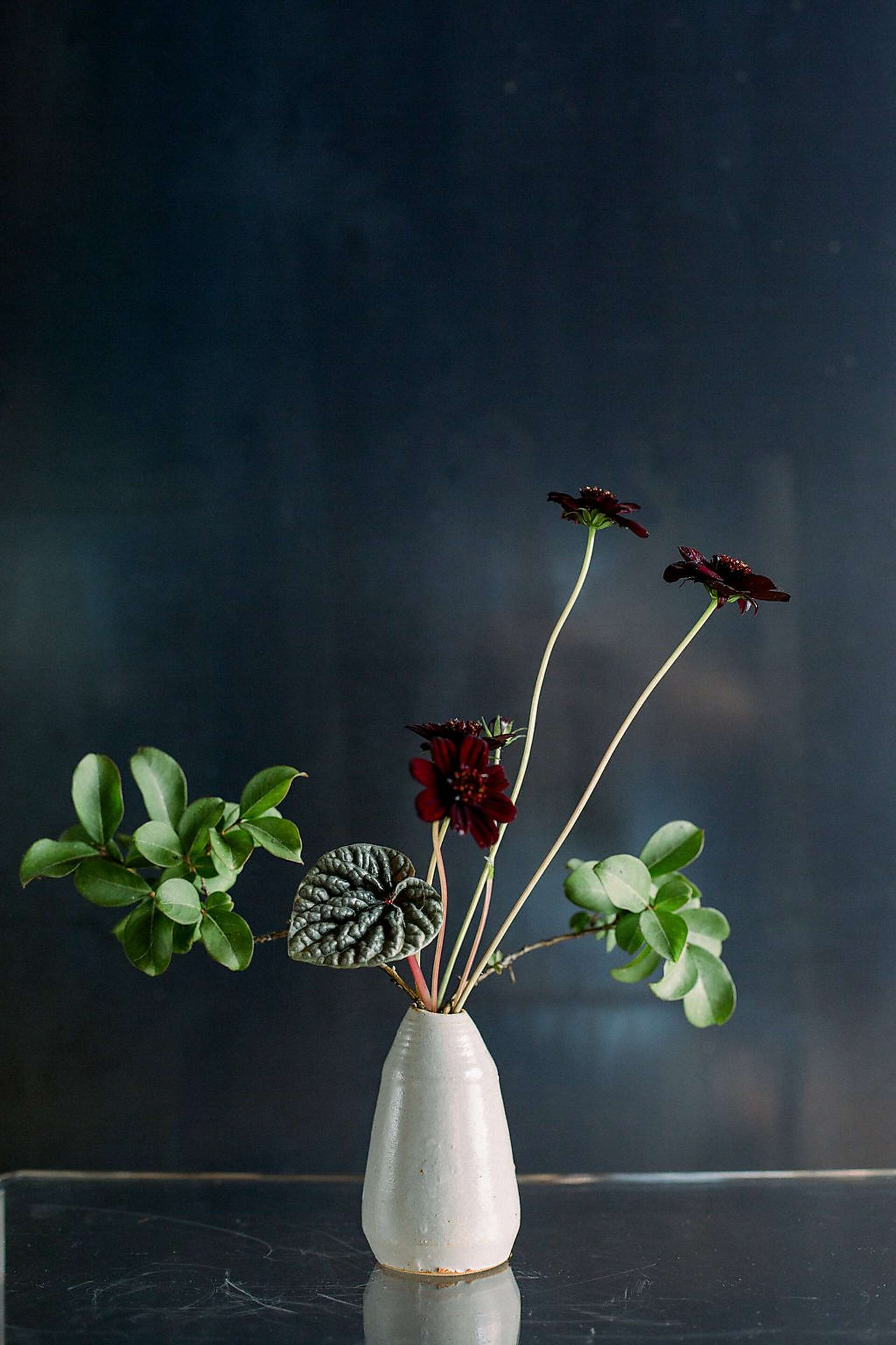 Florists highlight floral displays in beautiful, custom vases that they ...