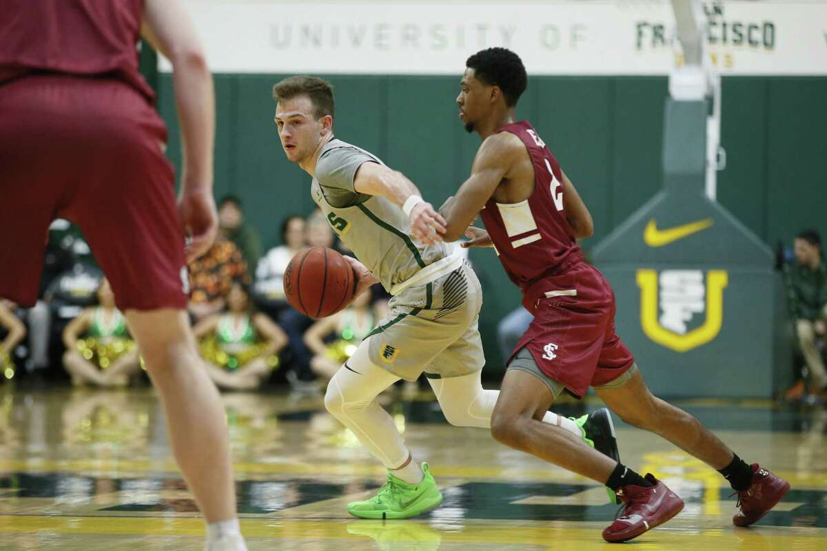 USF’s Frankie Ferrari, a ‘basketball junkie,’ thriving in senior season