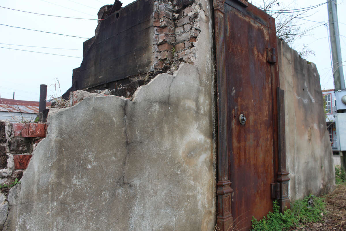 Antique vault in downtown Tomball explained, mascot statue too