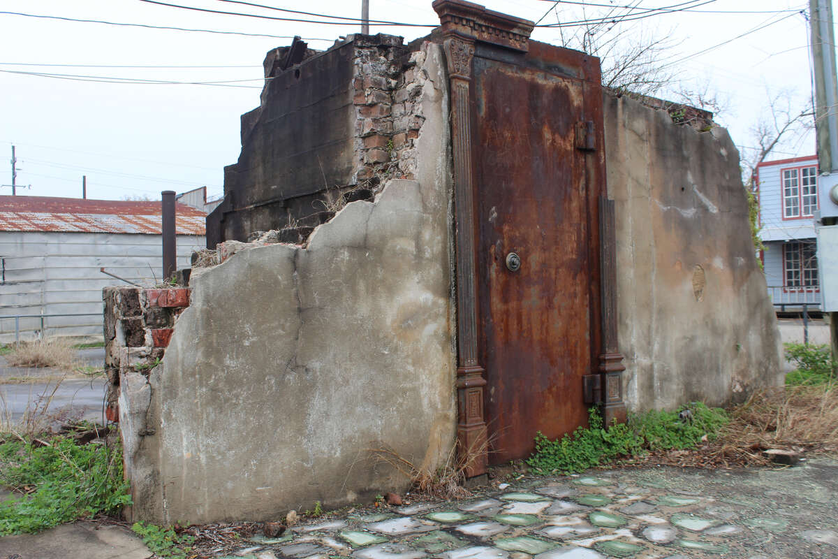 Antique vault in downtown Tomball explained, mascot statue too