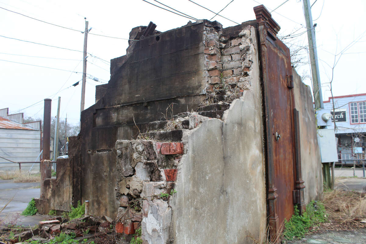 Antique vault in downtown Tomball explained, mascot statue too