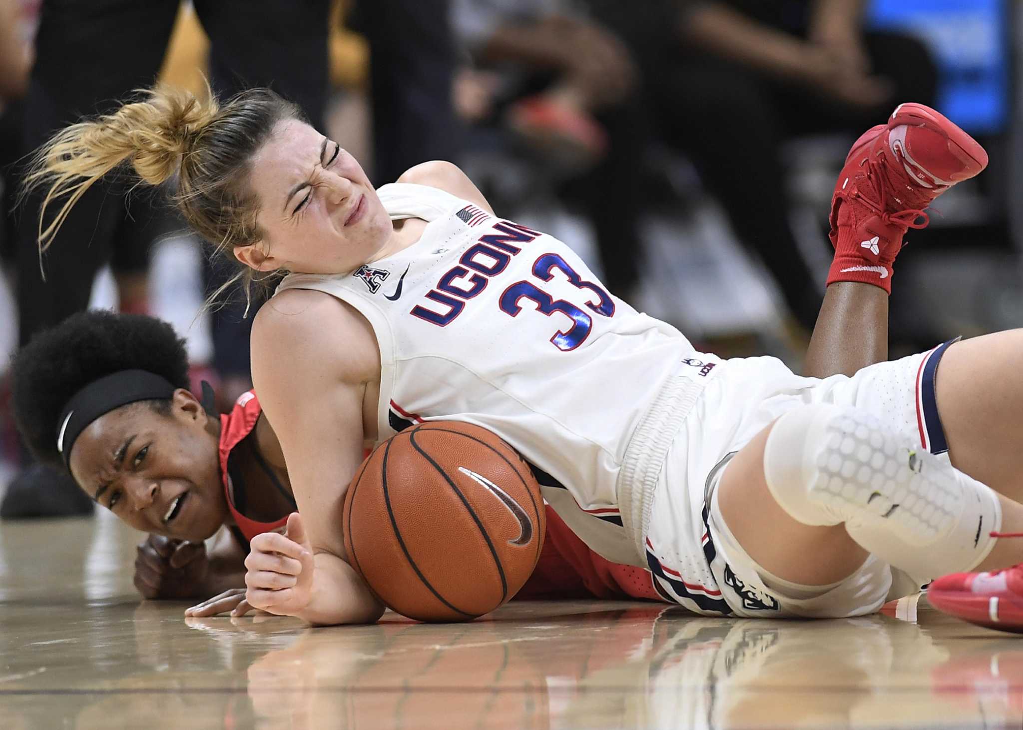 Samuelson leaves with injury as UConn beats Houston on Senior Day