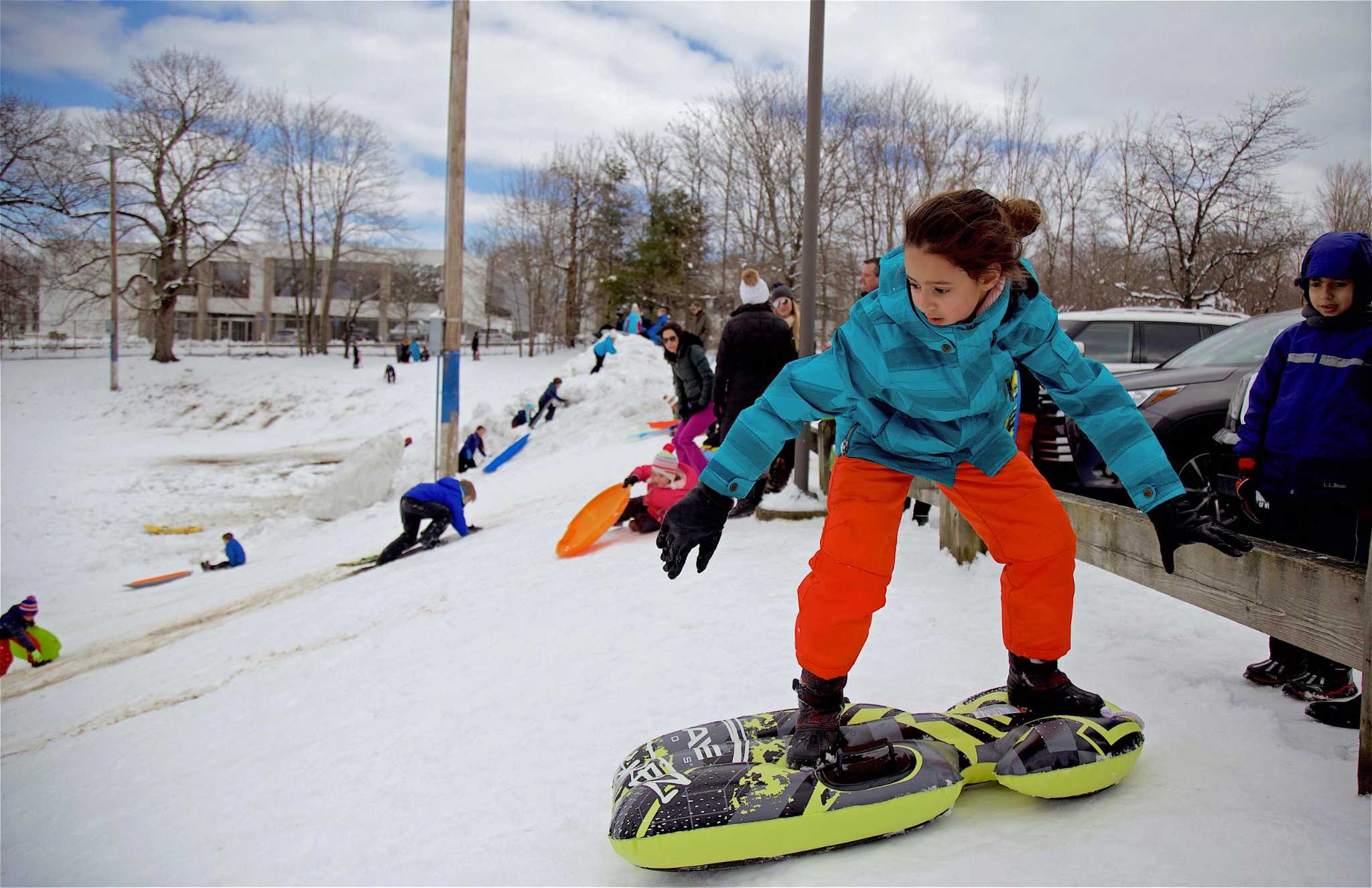 In Pictures / Students take to the sleds on snow day