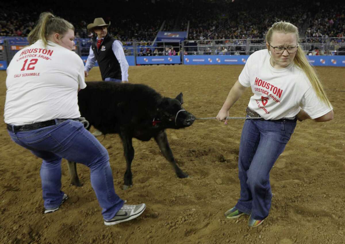 Kids scramble to catch calves and college at RodeoHouston