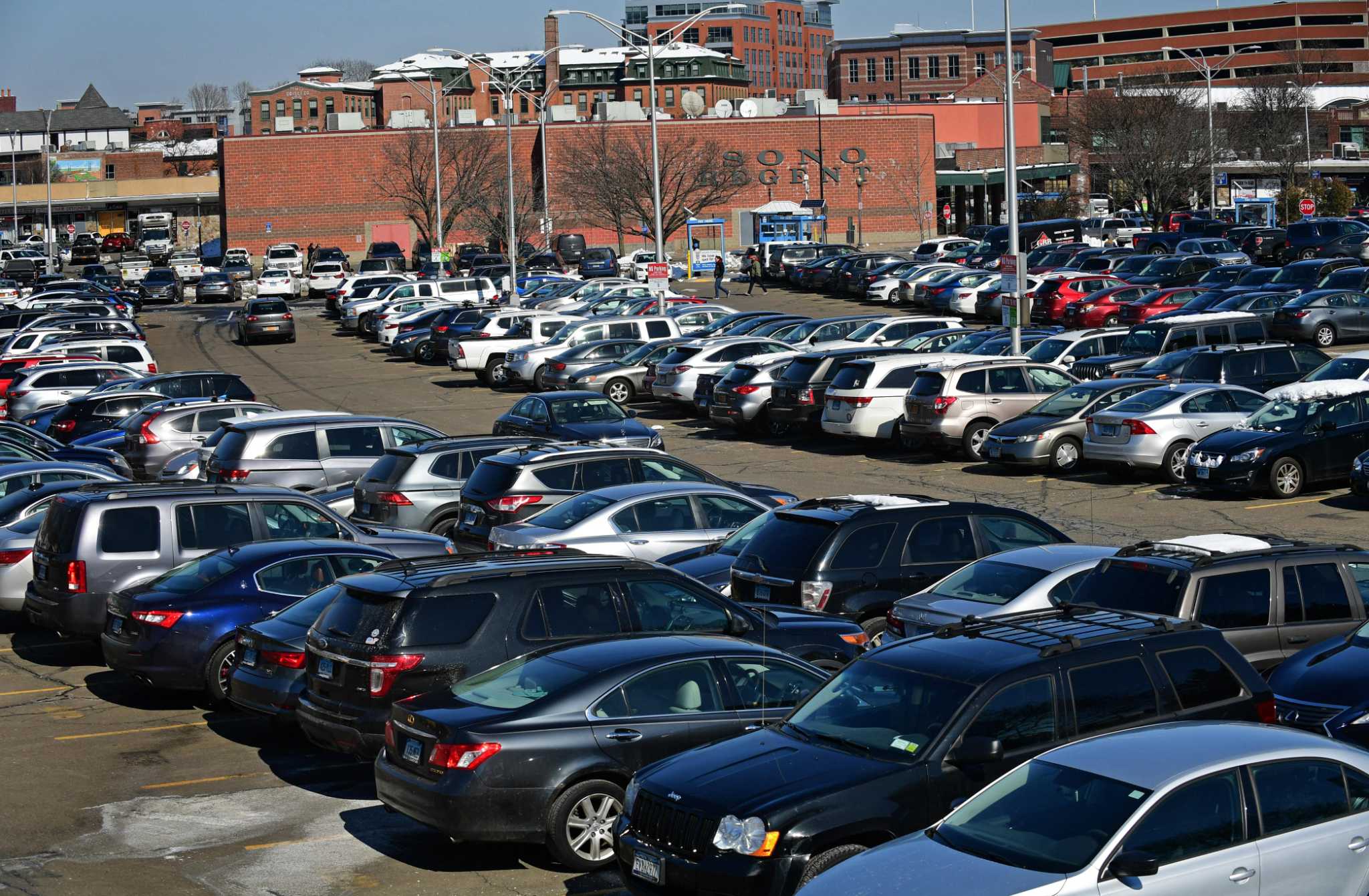 SoNo Collection workers clogging area lots, streets