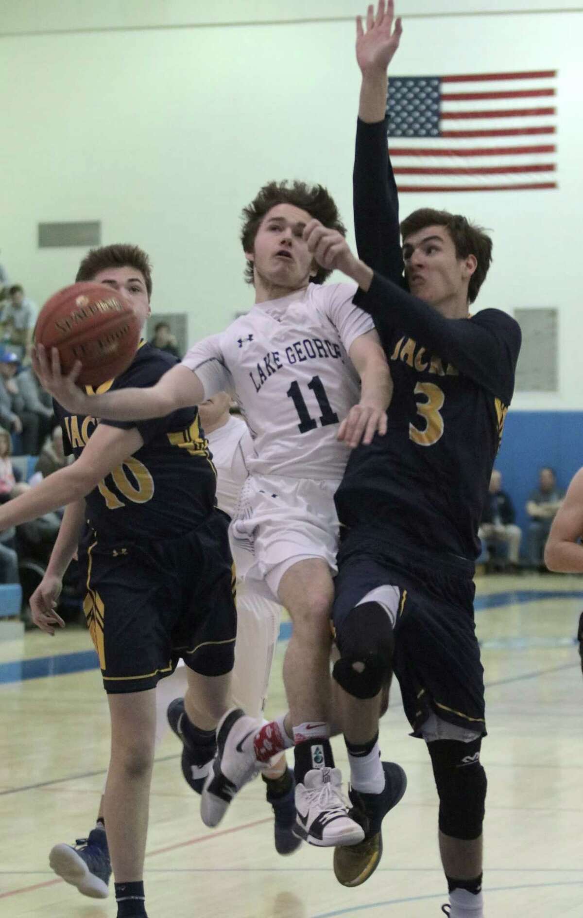 Lake George boys' basketball holds on for win against Madrid-Waddington