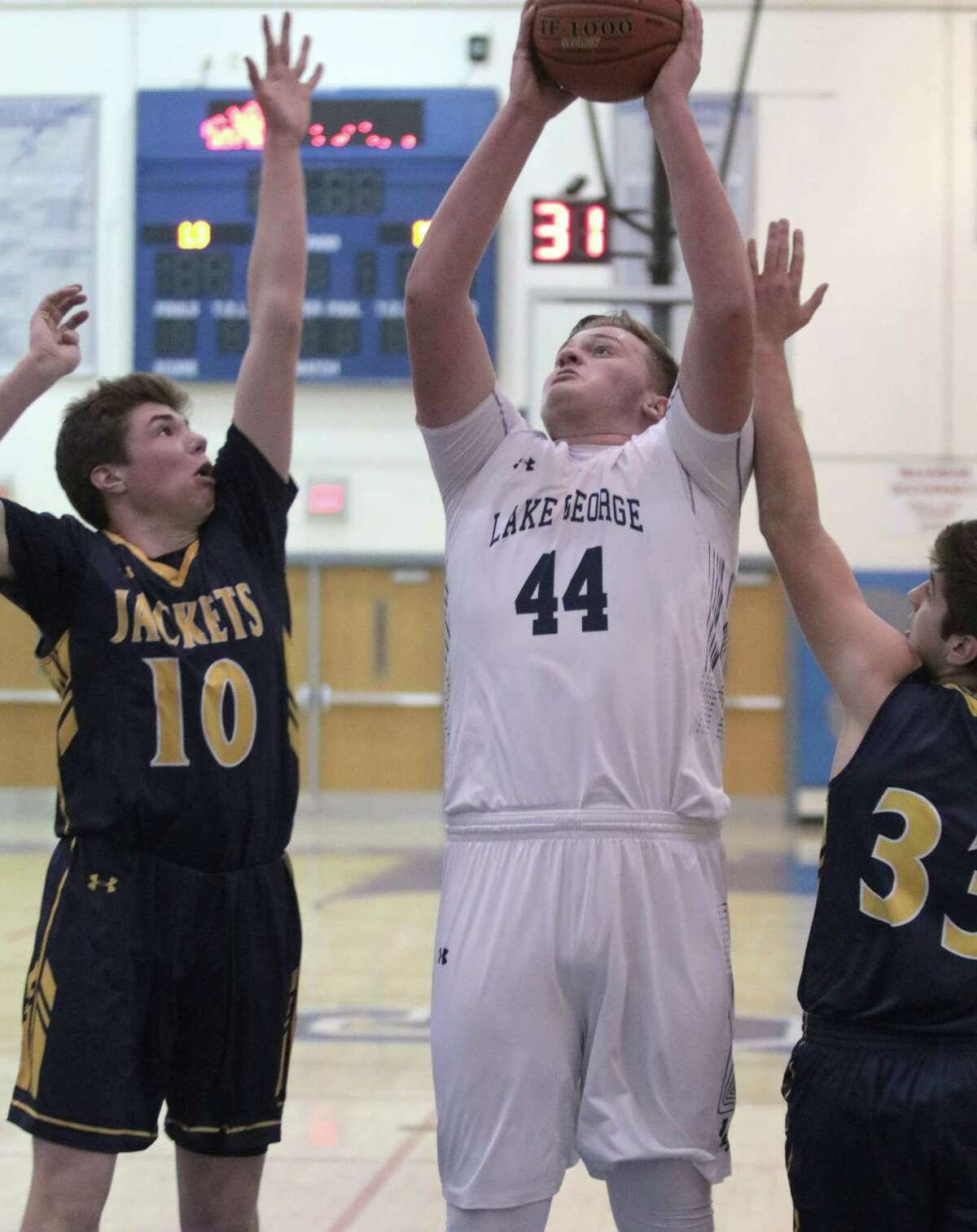 Lake George boys' basketball holds on for win against Madrid-Waddington