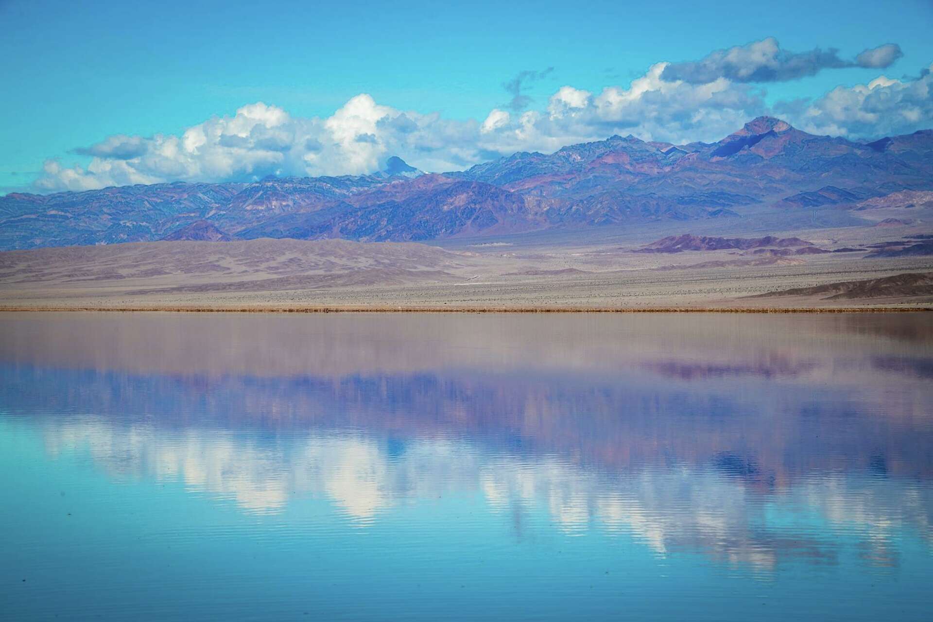 Rare 10-mile-long lake forms in Death Valley after heavy rains and flooding