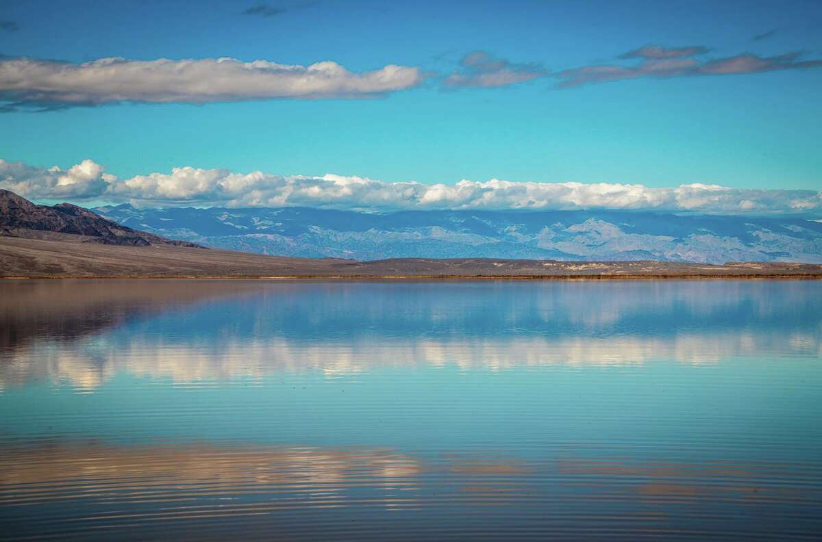 Rare 10-mile-long lake forms in Death Valley after heavy rains and flooding