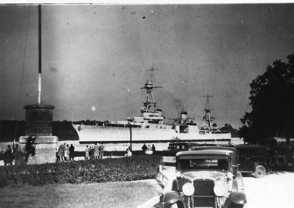 Rare photos show USS Houston visiting city