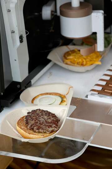 At Creator, a robot makes your burger. It doesn’t make you any less ...