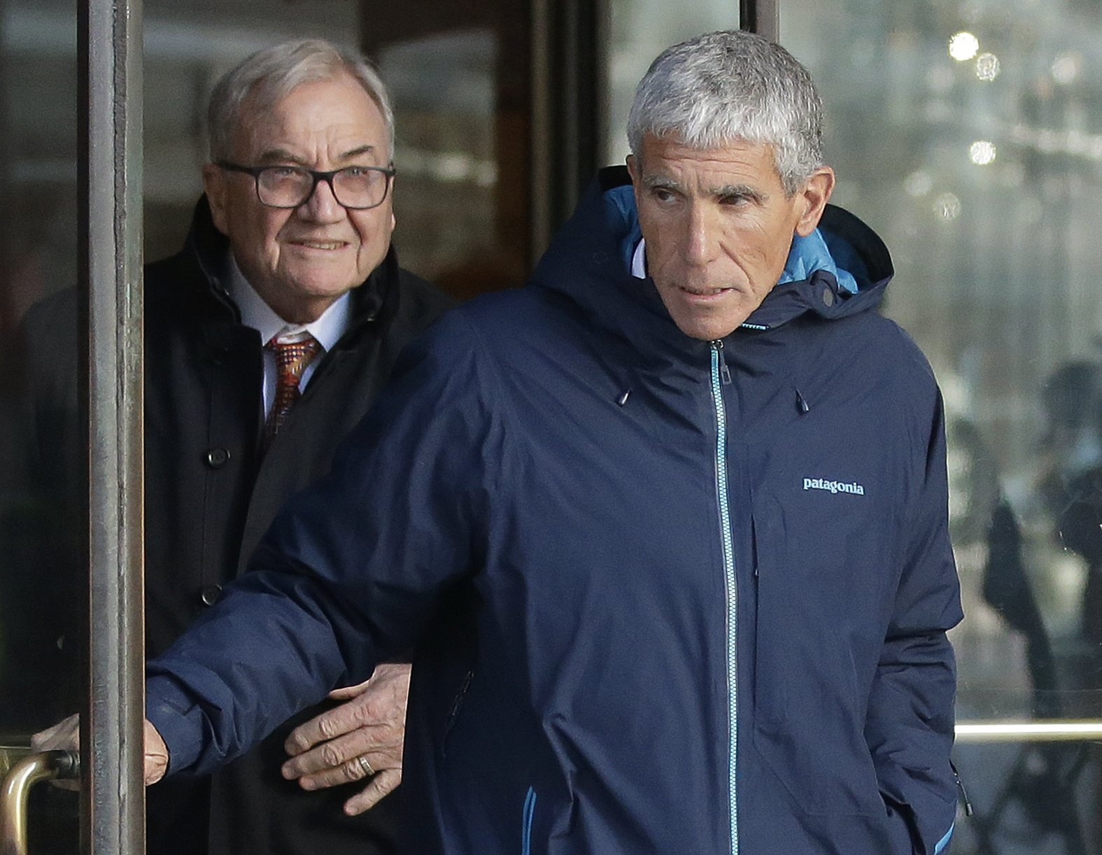 Who got charged in the college admissions cheating scandal
