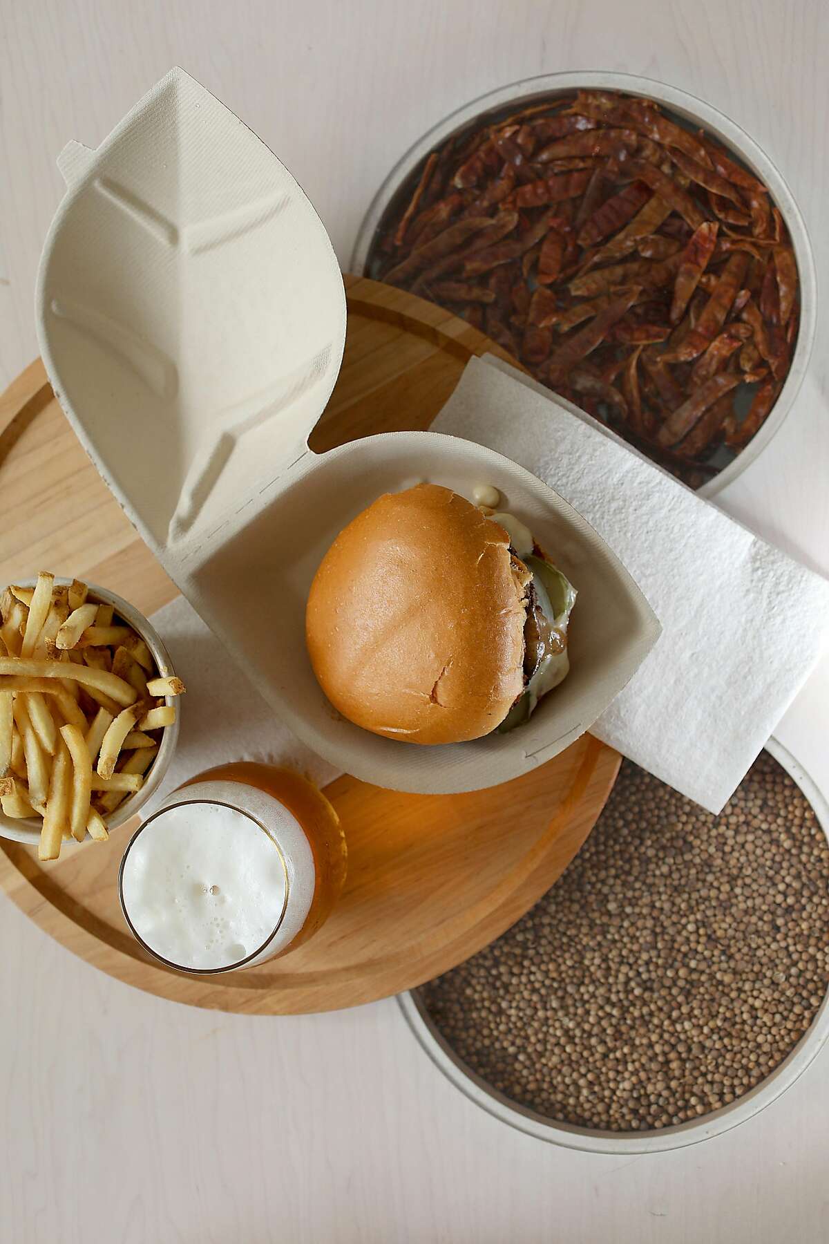 At Creator, a robot makes your burger. It doesn’t make you any less ...