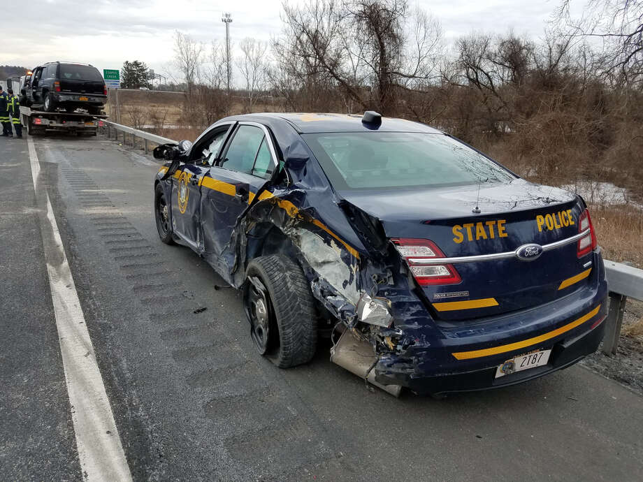 Trooper, man changing tire hurt when truck doesn't yield, troopers said ...