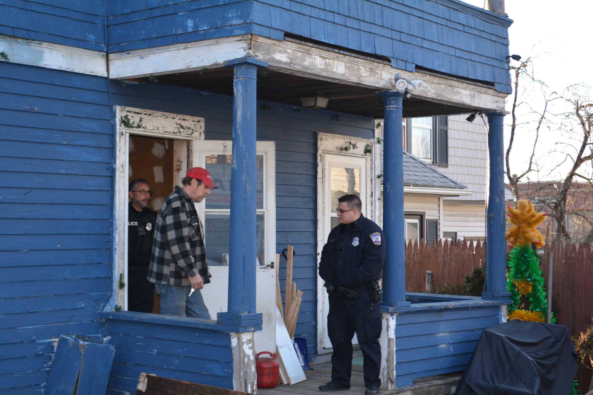 Torrington police escort Merriman out of ‘Christmas House’