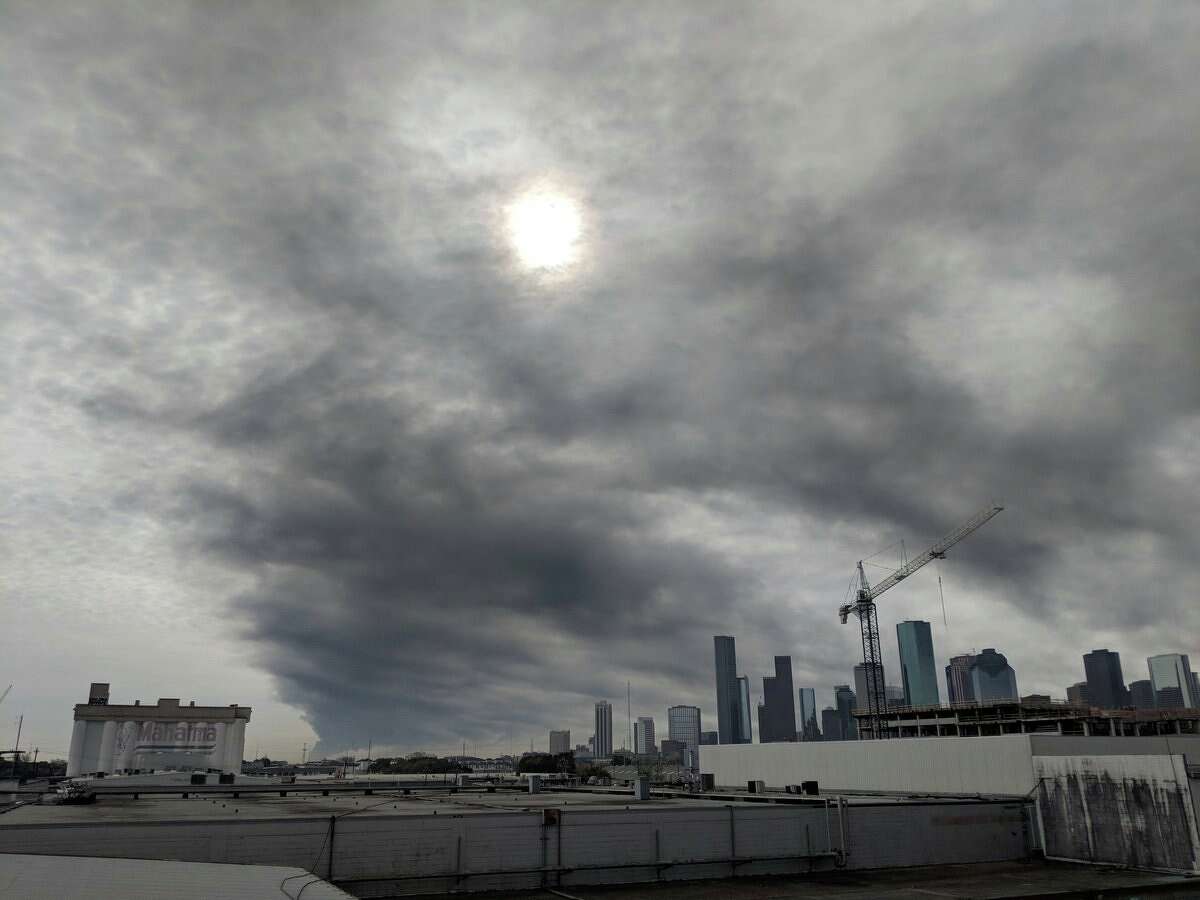Photos from the ground show smoke plume over Houston
