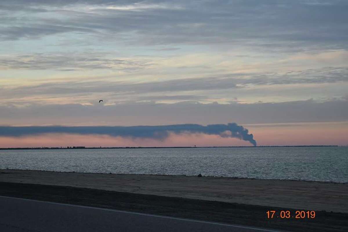 Photos from the ground show smoke plume over Houston