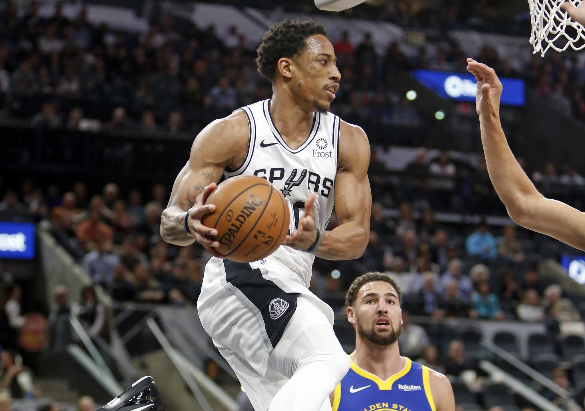 Spurs defense holds down Warriors