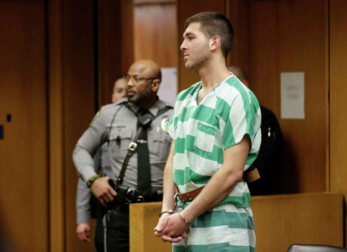 Suspect in mob boss hit flashes pro-Trump slogans on hand