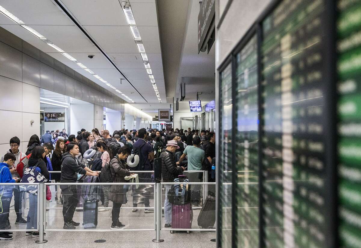 SFO flights briefly delayed after bag with gun magazine slips by security