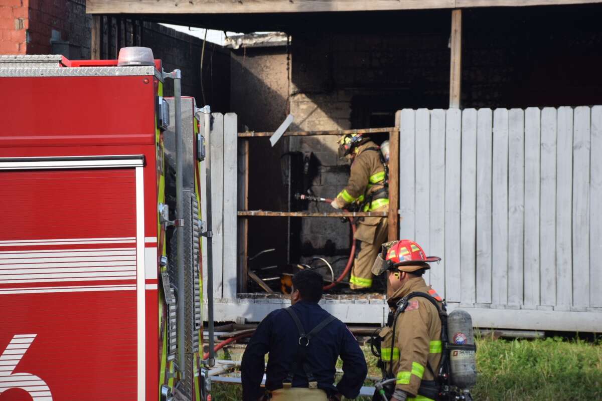 Firefighter falls through roof while extinguishing blaze at downtown bar