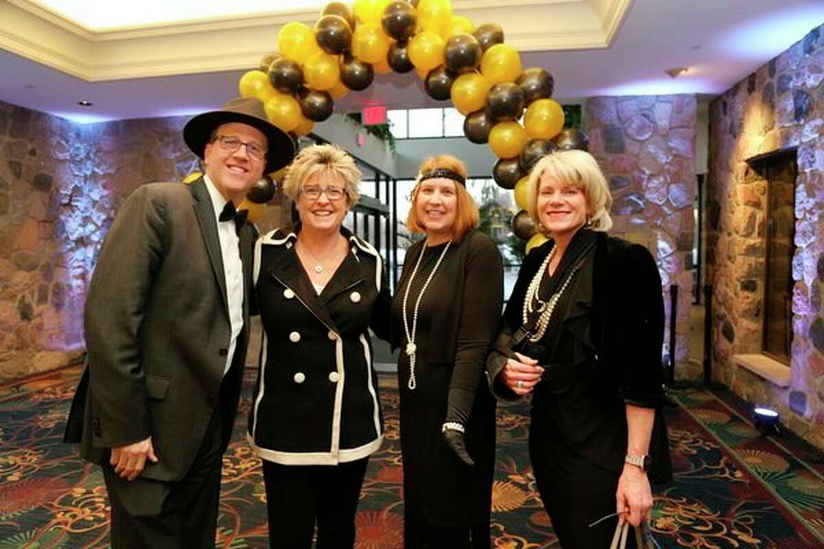 Feathers and Fedoras a roaring success for Disability Network