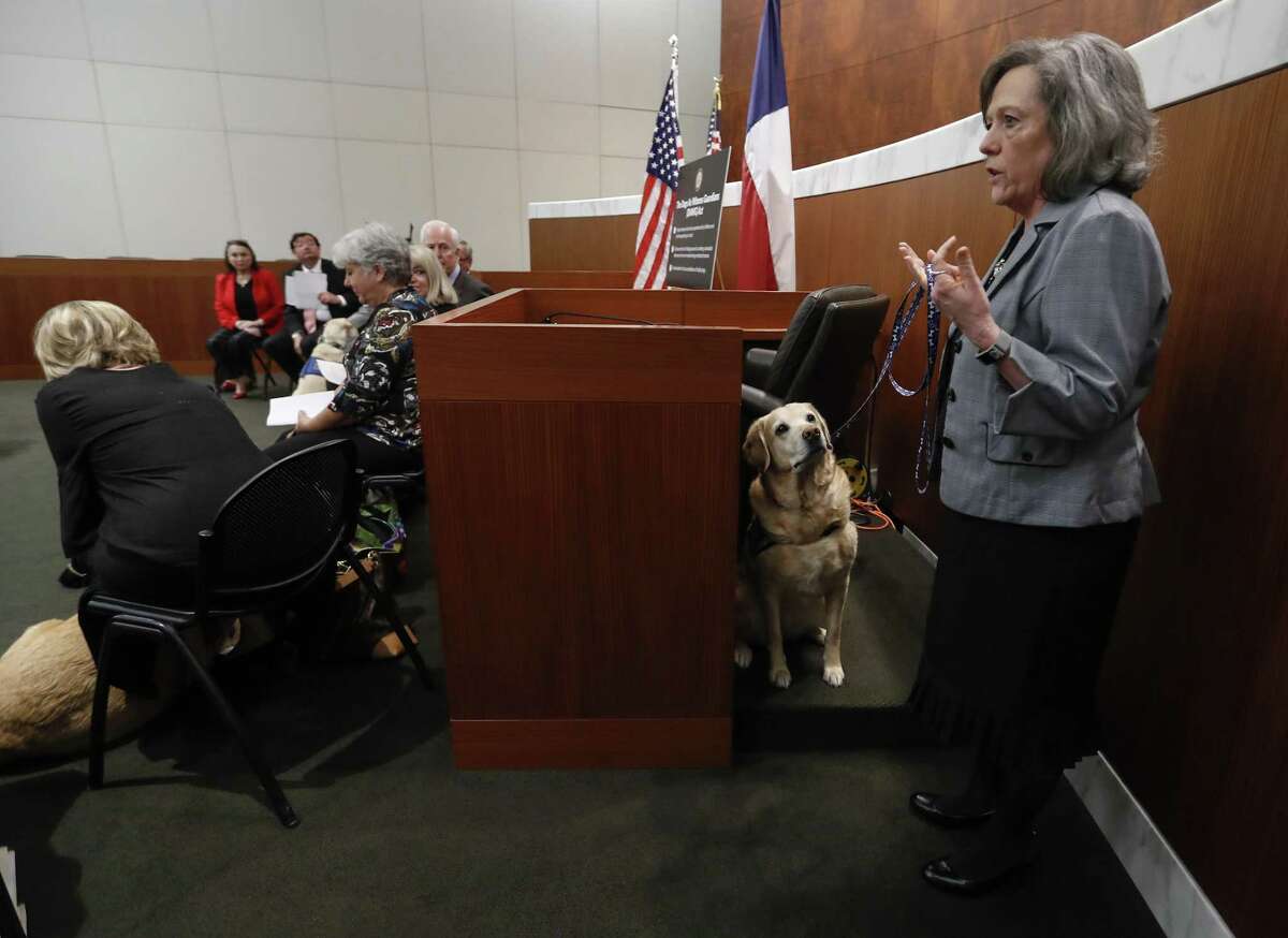 Officials in Houston tout law to allow support dogs in federal courtrooms