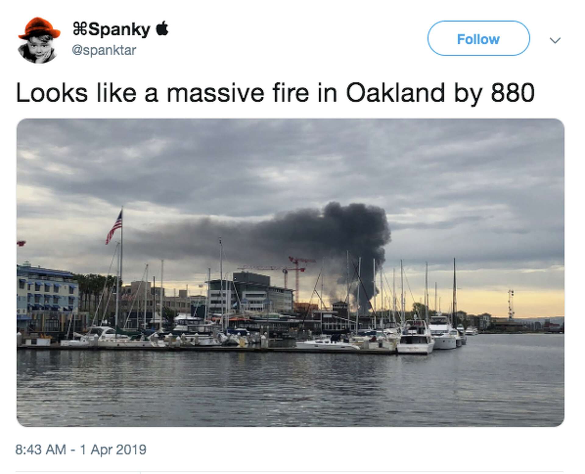 Fire in Oakland pumps out cloud of black smoke