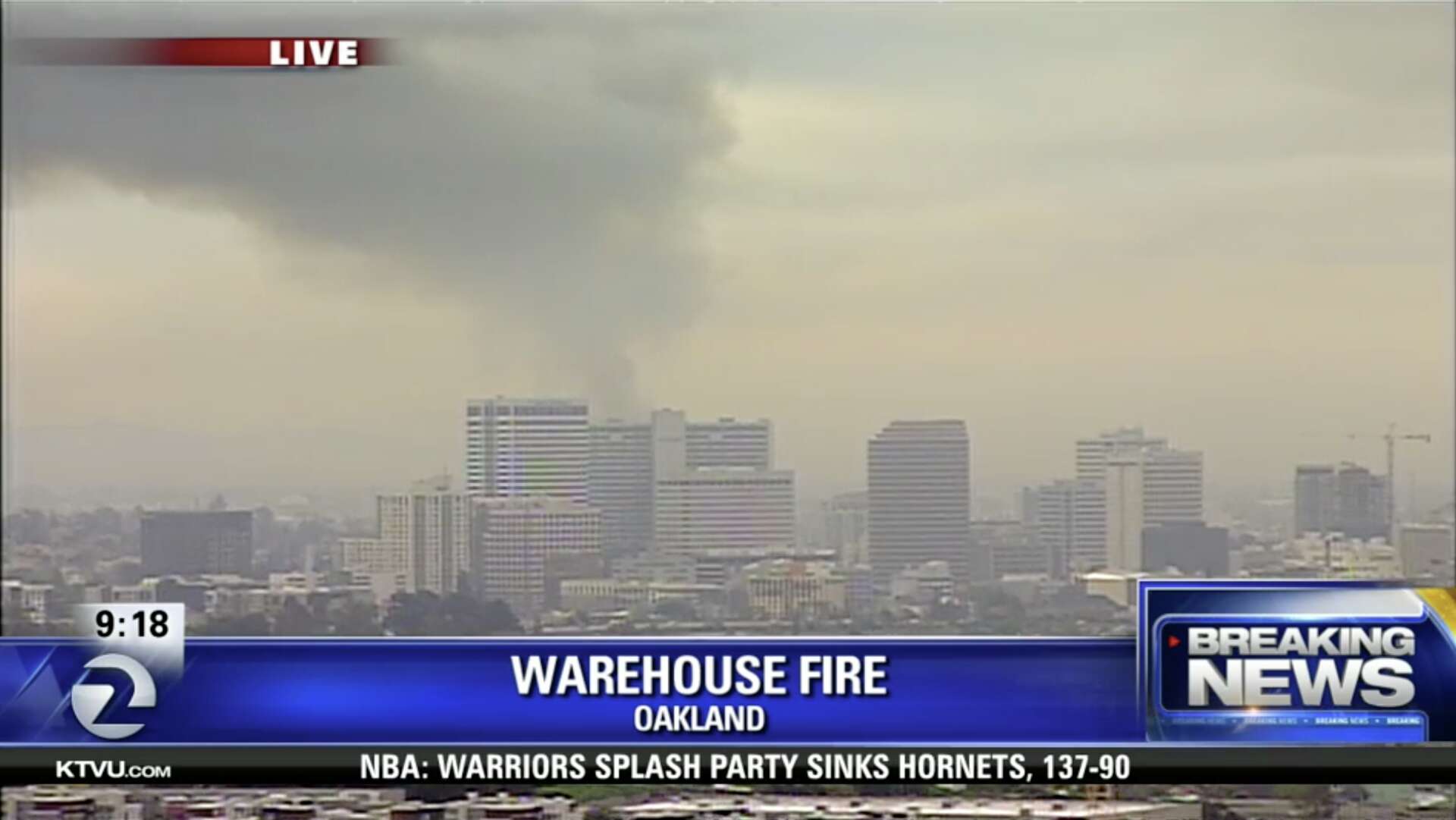 Fire in Oakland pumps out cloud of black smoke