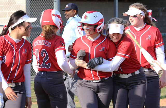 PREP SOFTBALL: Wong’s slam caps Redbirds’ comeback in 16-11 win over East