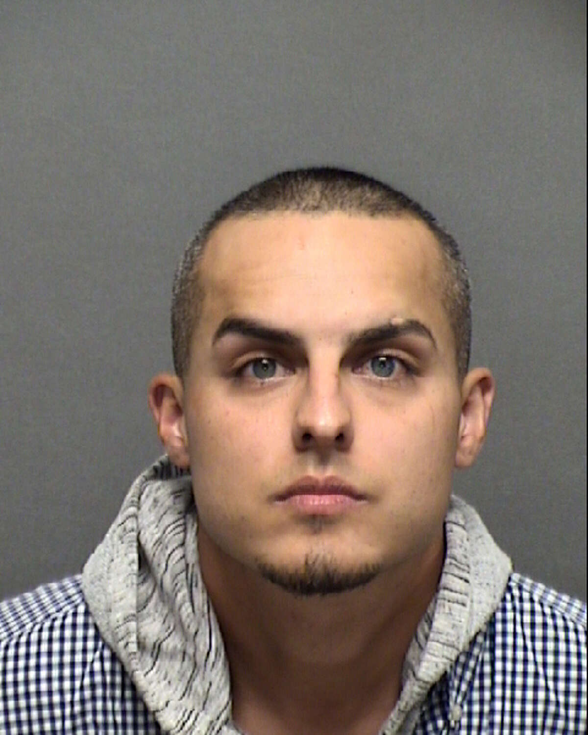 SAPD: Suspect's gray and pink hoodie links him to robbery