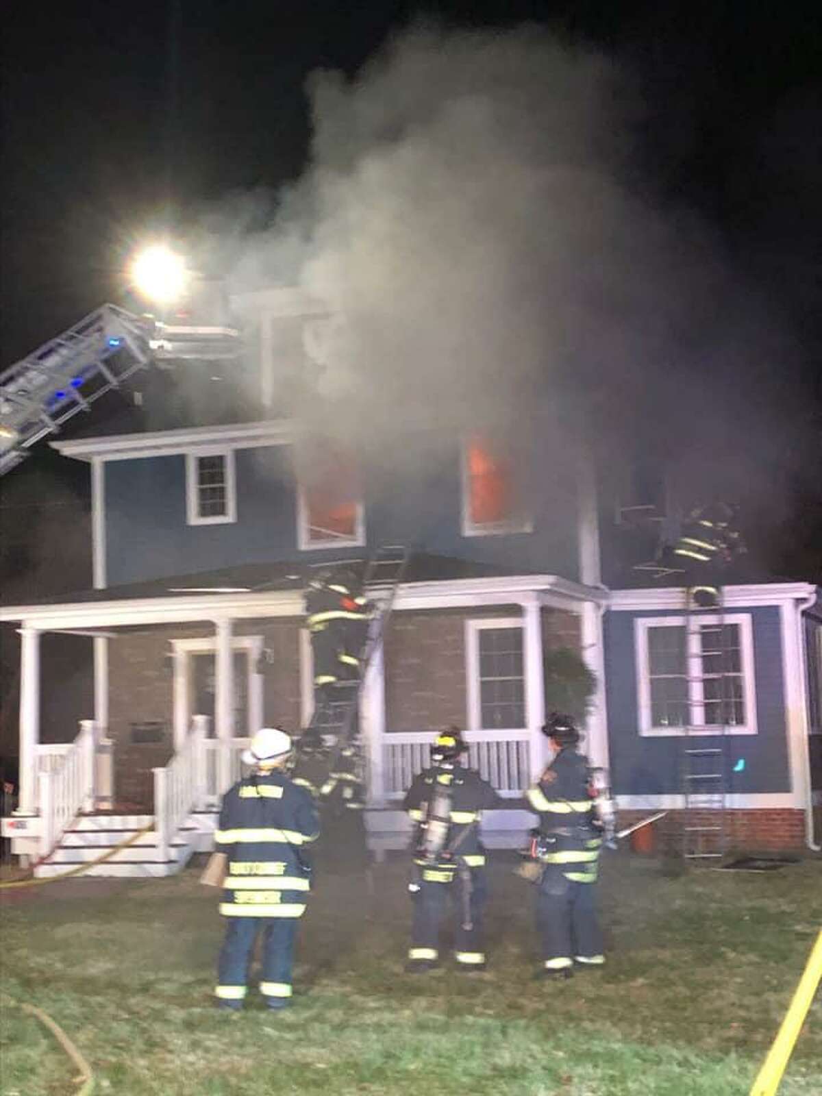 Woman sent to hospital, pets saved, after Hamden fire caused by candle