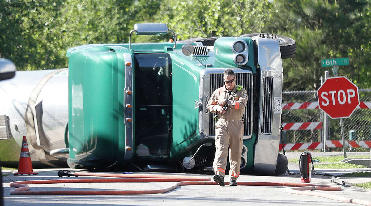 HFD: Cleanup of overturned tanker truck in Heights could take hours