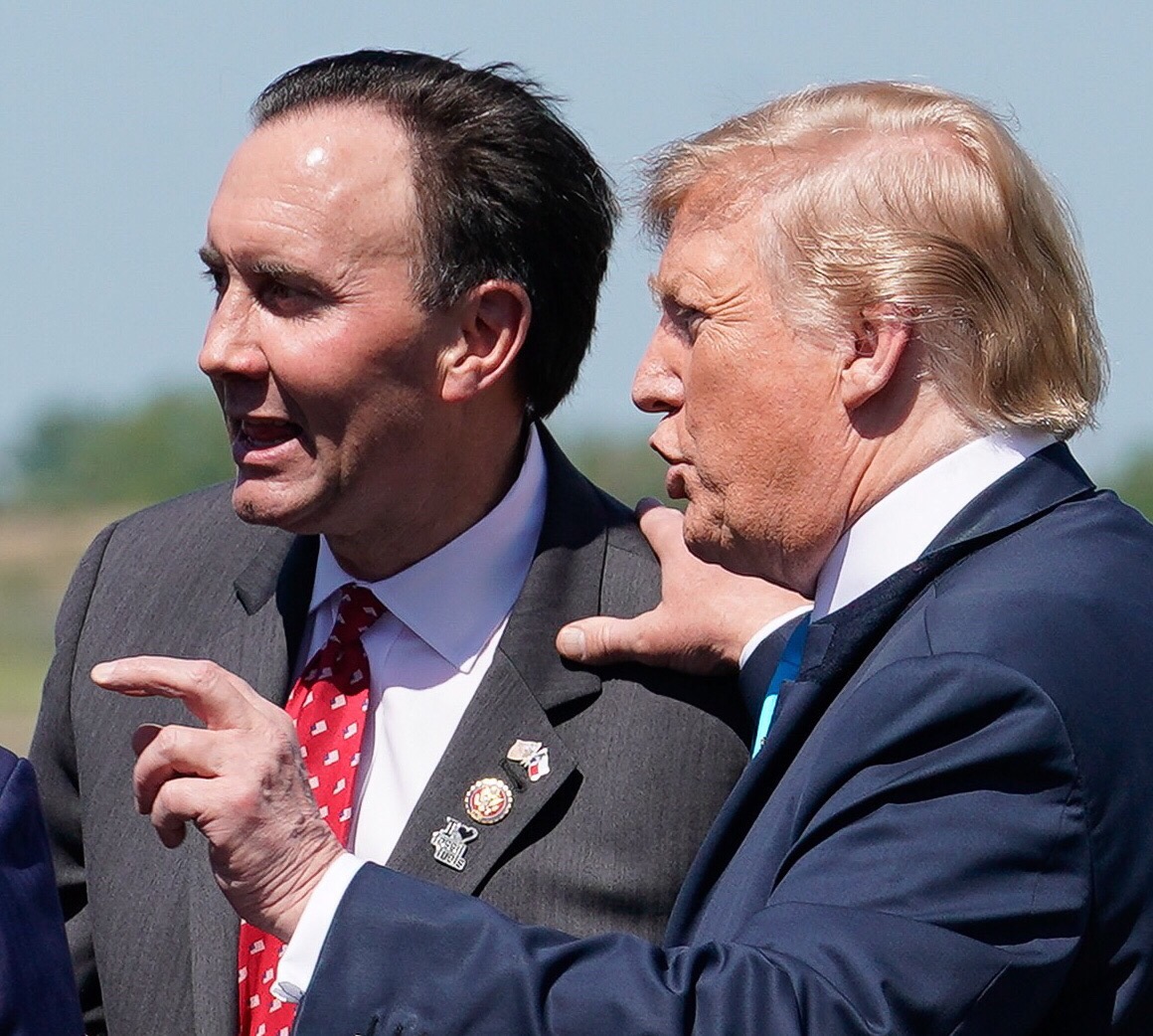 Texas congressman Pete Olson wears unique pin while greeting President ...