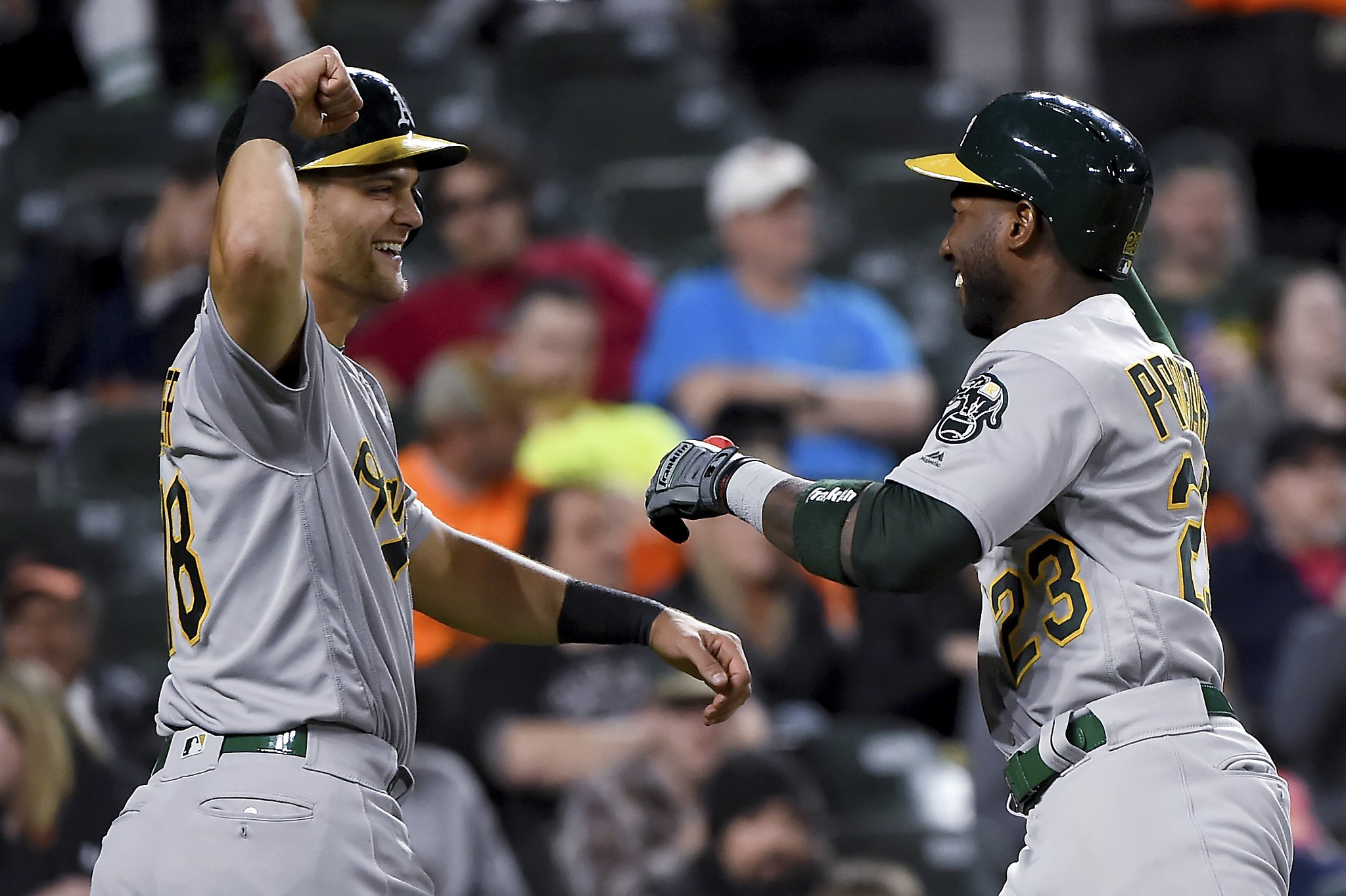 A’s Khris Davis bashes two homers, reaching 200 for career, in win