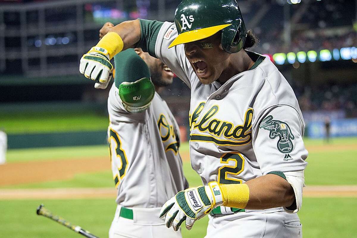 A’s Khris Davis has his usual blast in Texas, gives Oakland a comeback ...