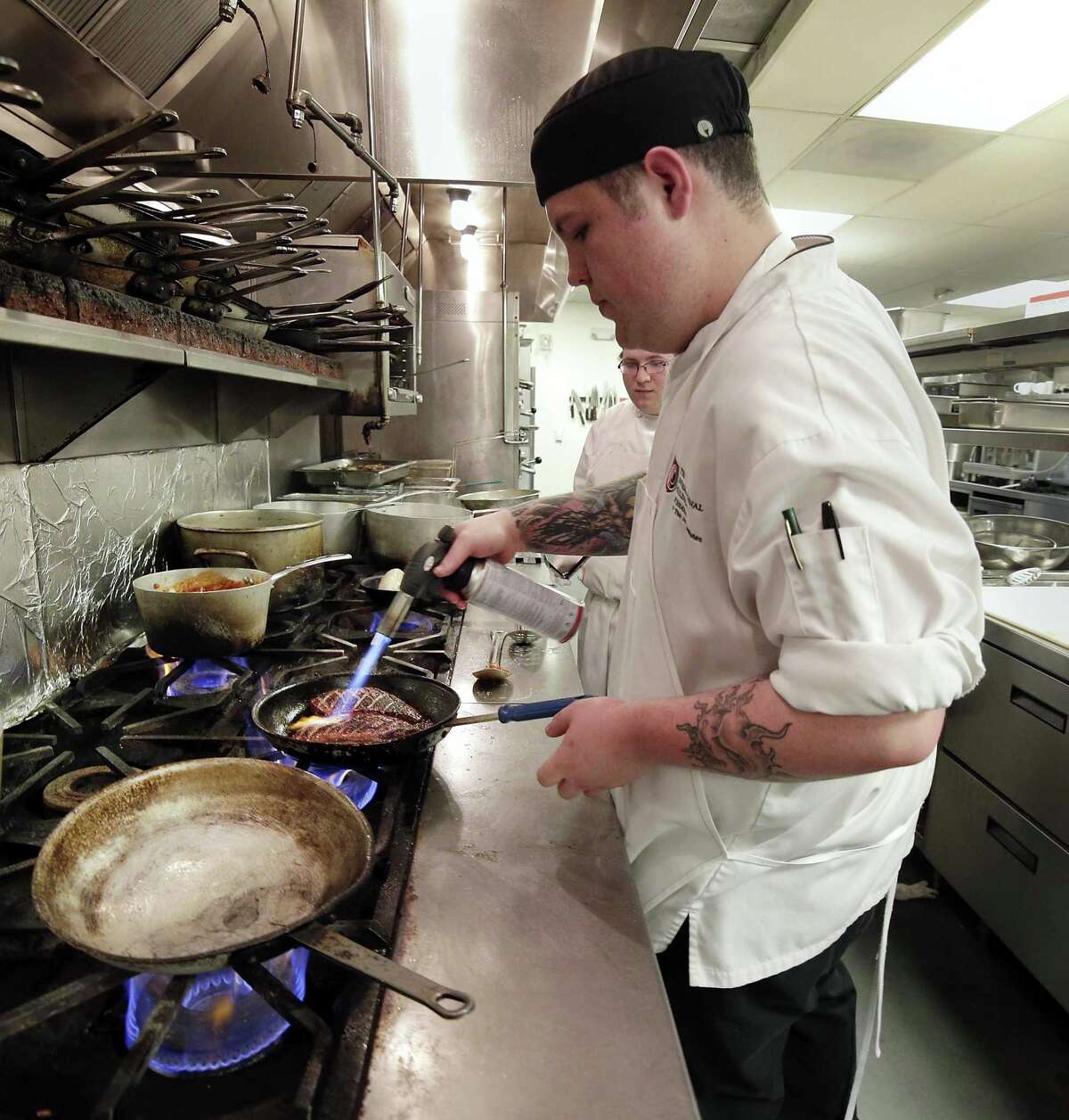 Novice chefs battle in kitchen for menu spot