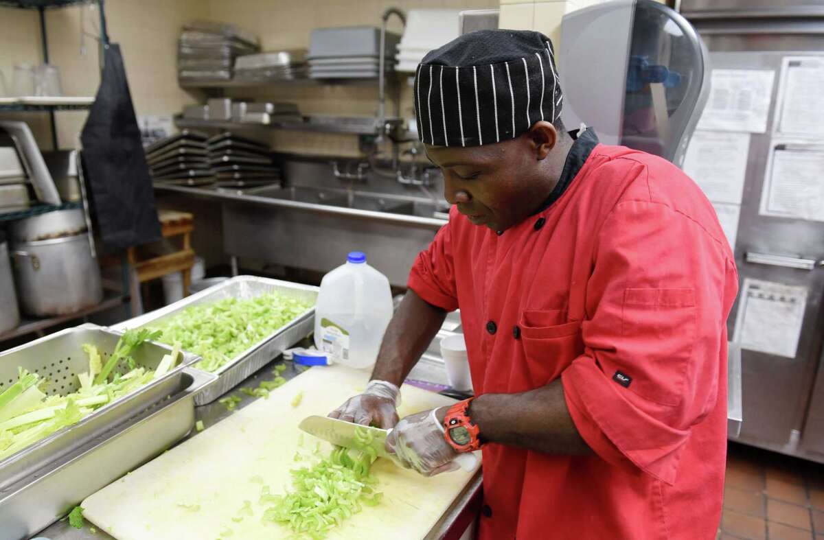 Photos: Rescue Mission preps 2,000 meals for Easter Sunday